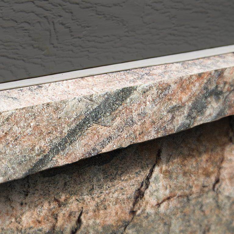 Round Side Out Wisconsin Granite Fieldstone Thin Stone Veneer